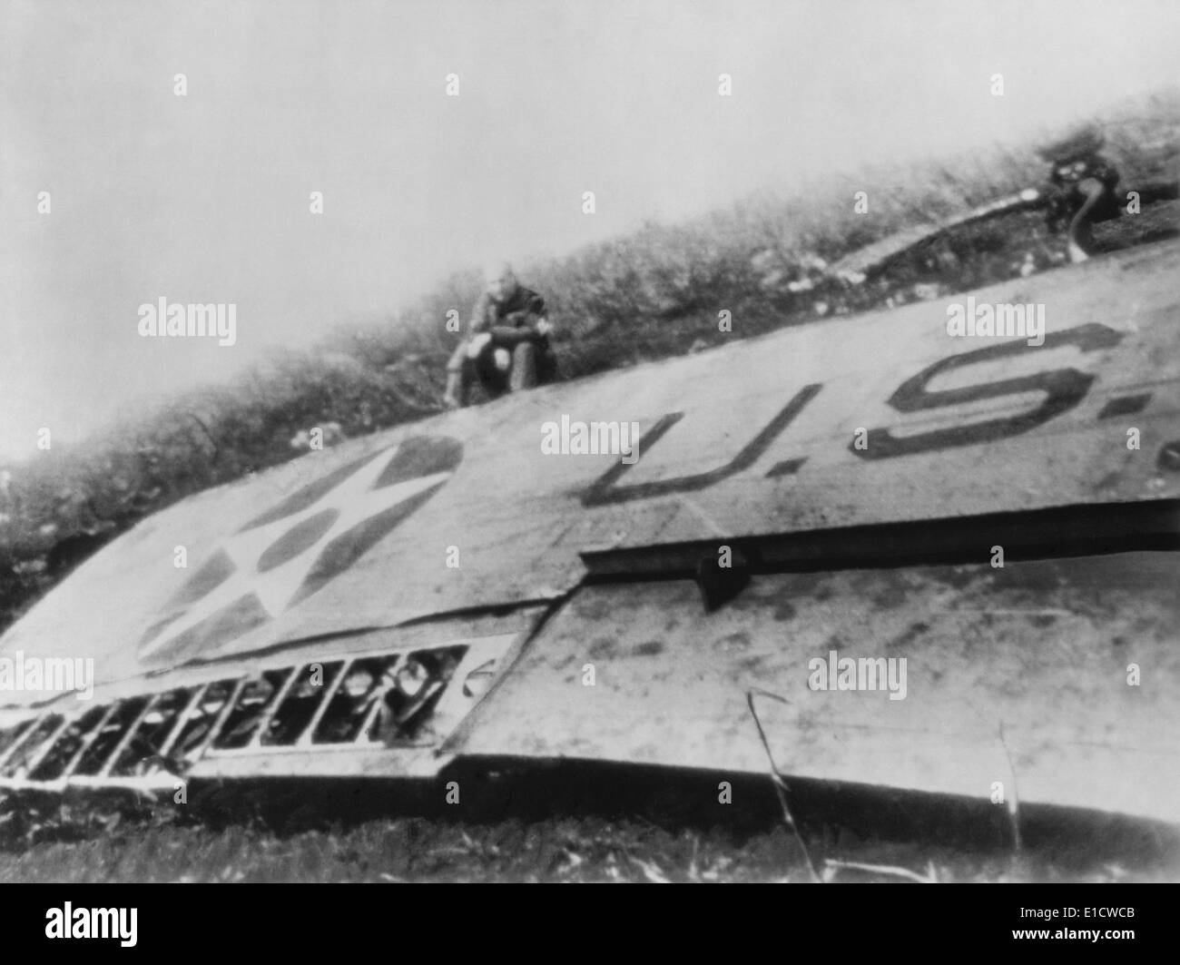 Lt. Col. Jimmy Doolittle sits by a wing of his crash-landed plane ...
