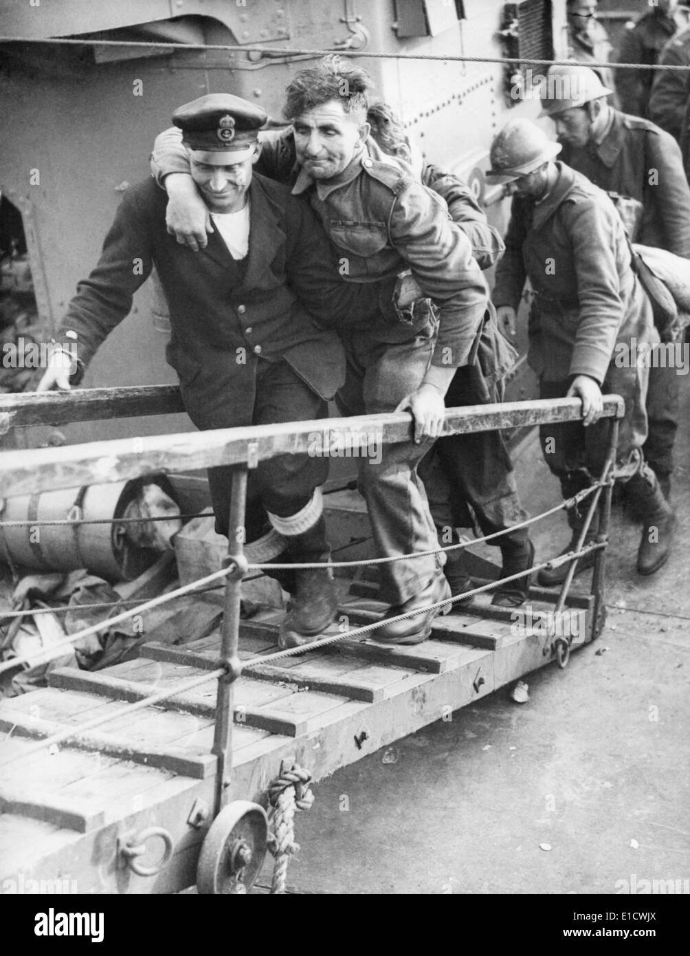 A British sailor assisting a wounded Tommy followed by French Troops ...