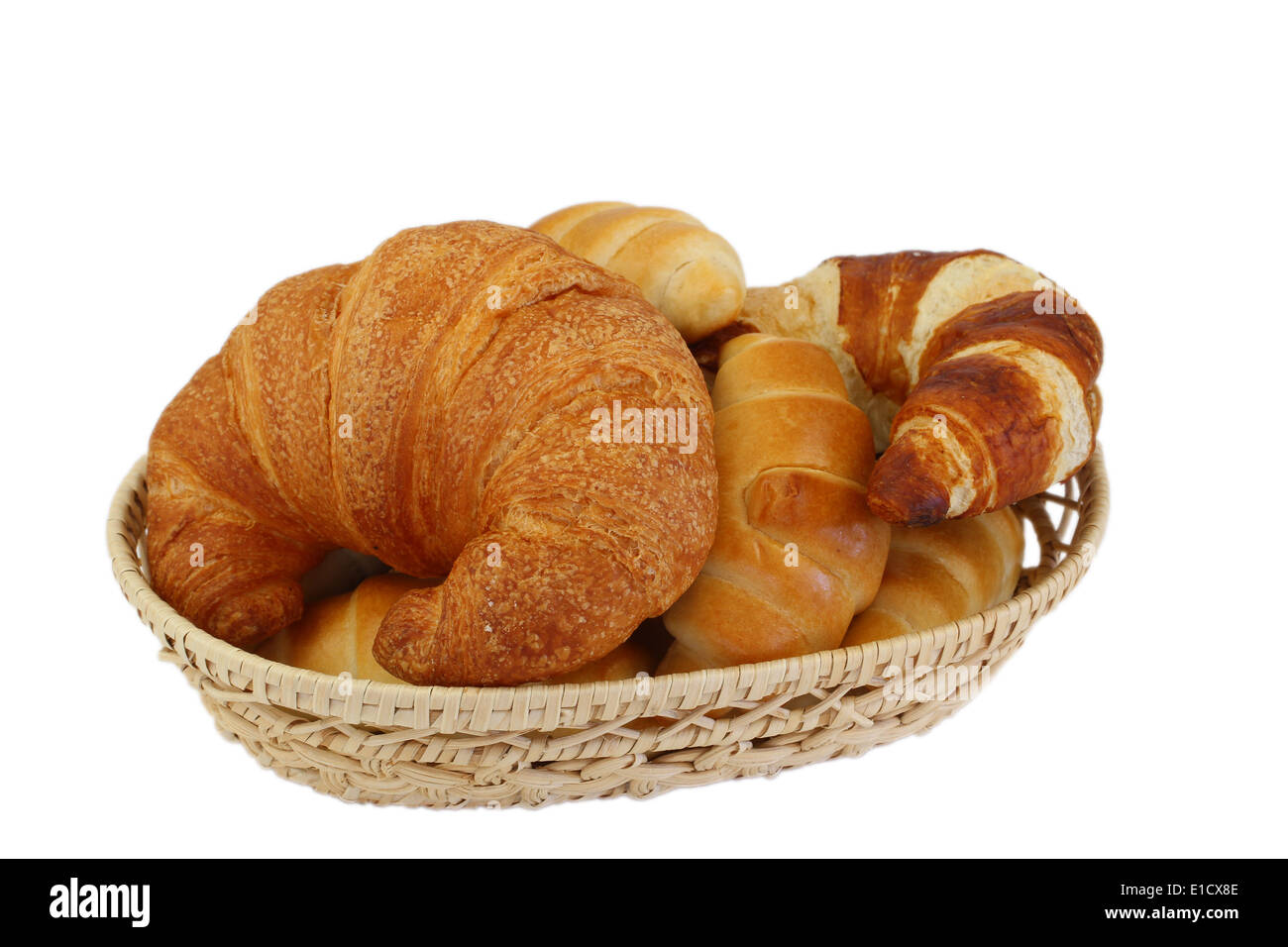 Butter croissants in bread basket isolated on white Stock Photo - Alamy