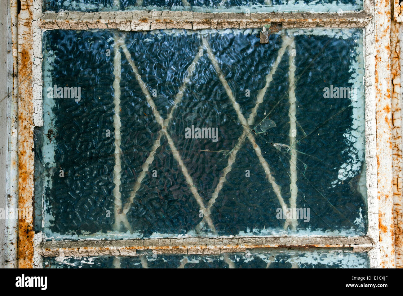neglected rusted window frame with cracked glass Stock Photo - Alamy