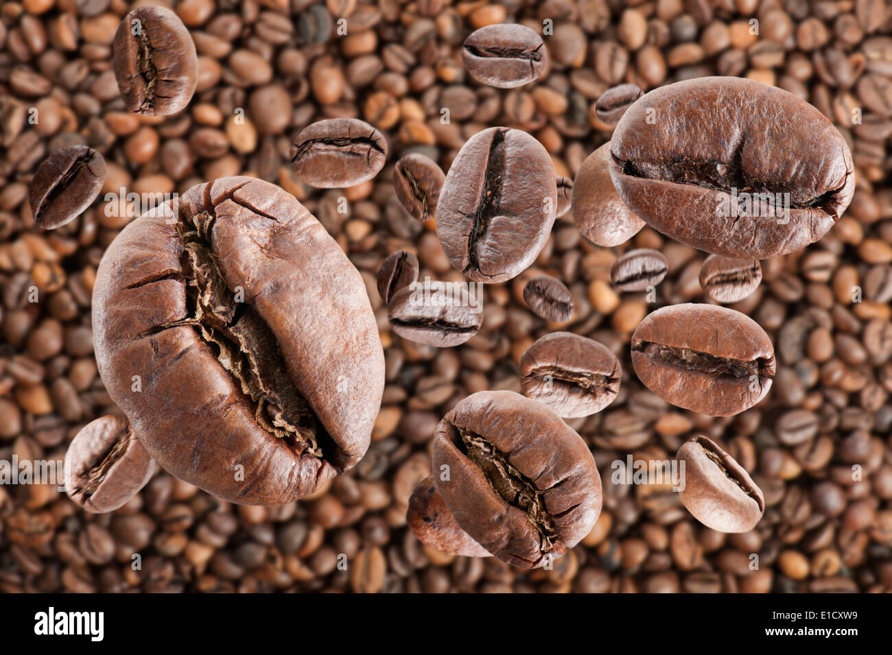 coffee beans rain on coffee beans background Stock Photo - Alamy
