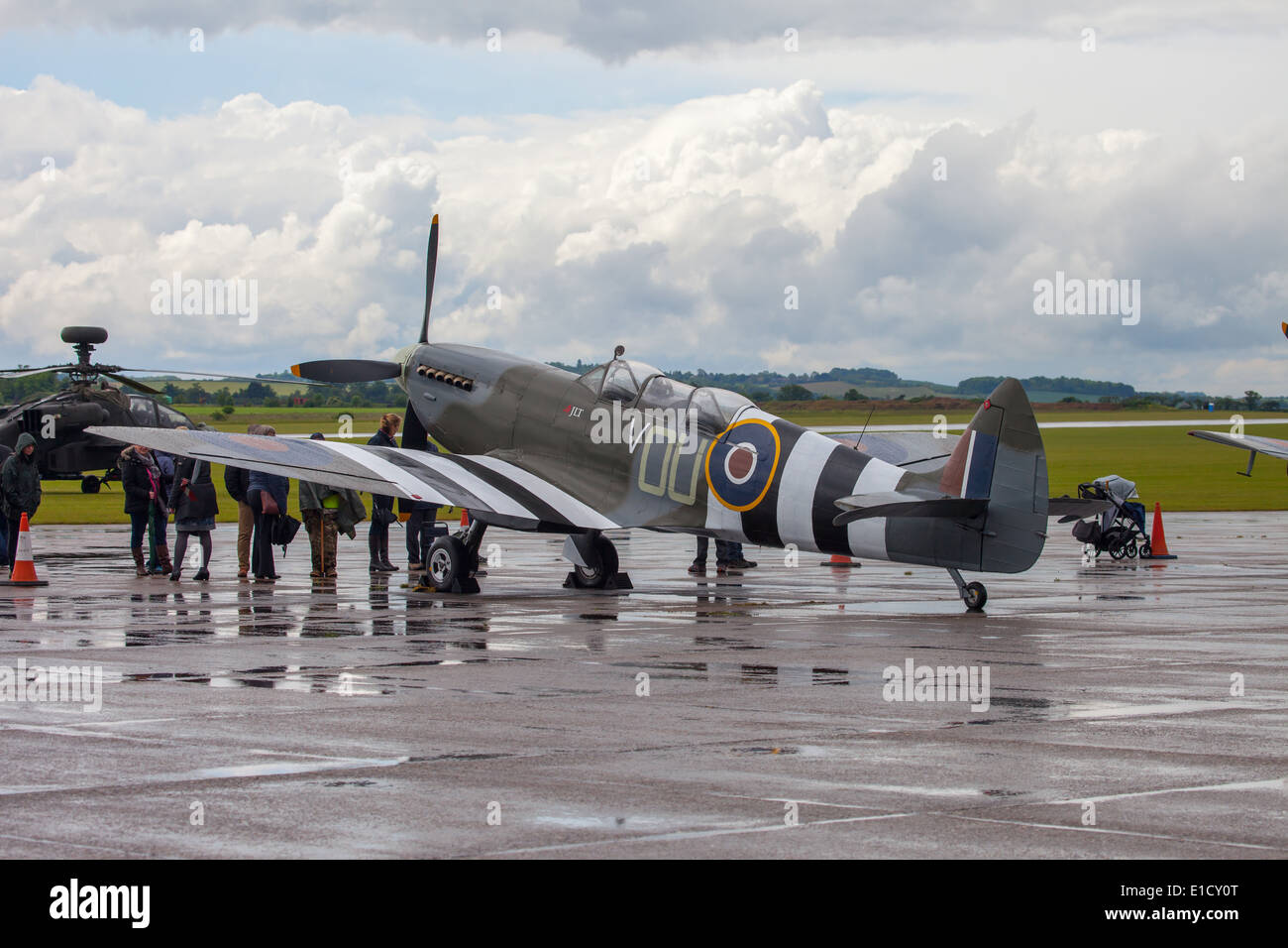 A World War II Spitfire fighter at Duxford Air Show in D-Day markings to celebrate the 70th ...