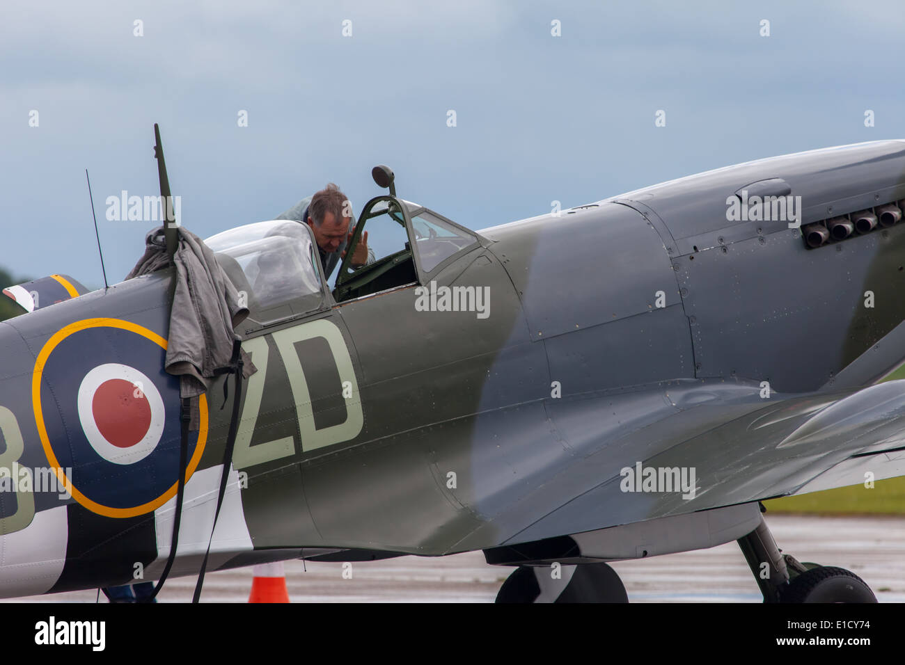 A World War 2 Spitfire being prepared for flight at The Duxford Airshow ...