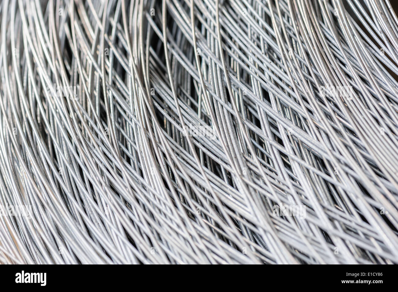 hank of metal wire background Stock Photo - Alamy