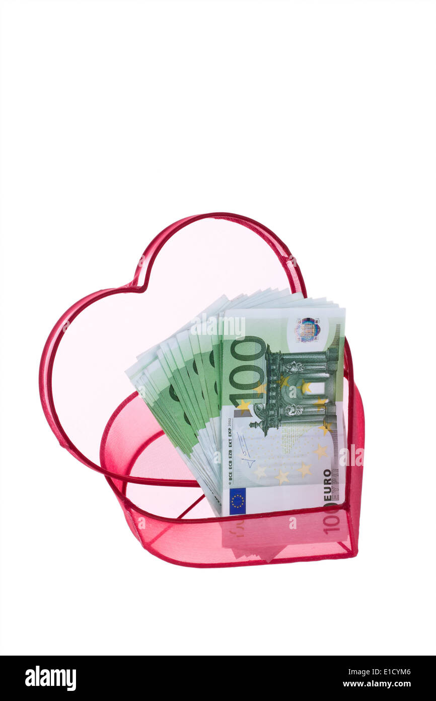 Many Euro notes with a heart. Isolated on white background Stock Photo ...