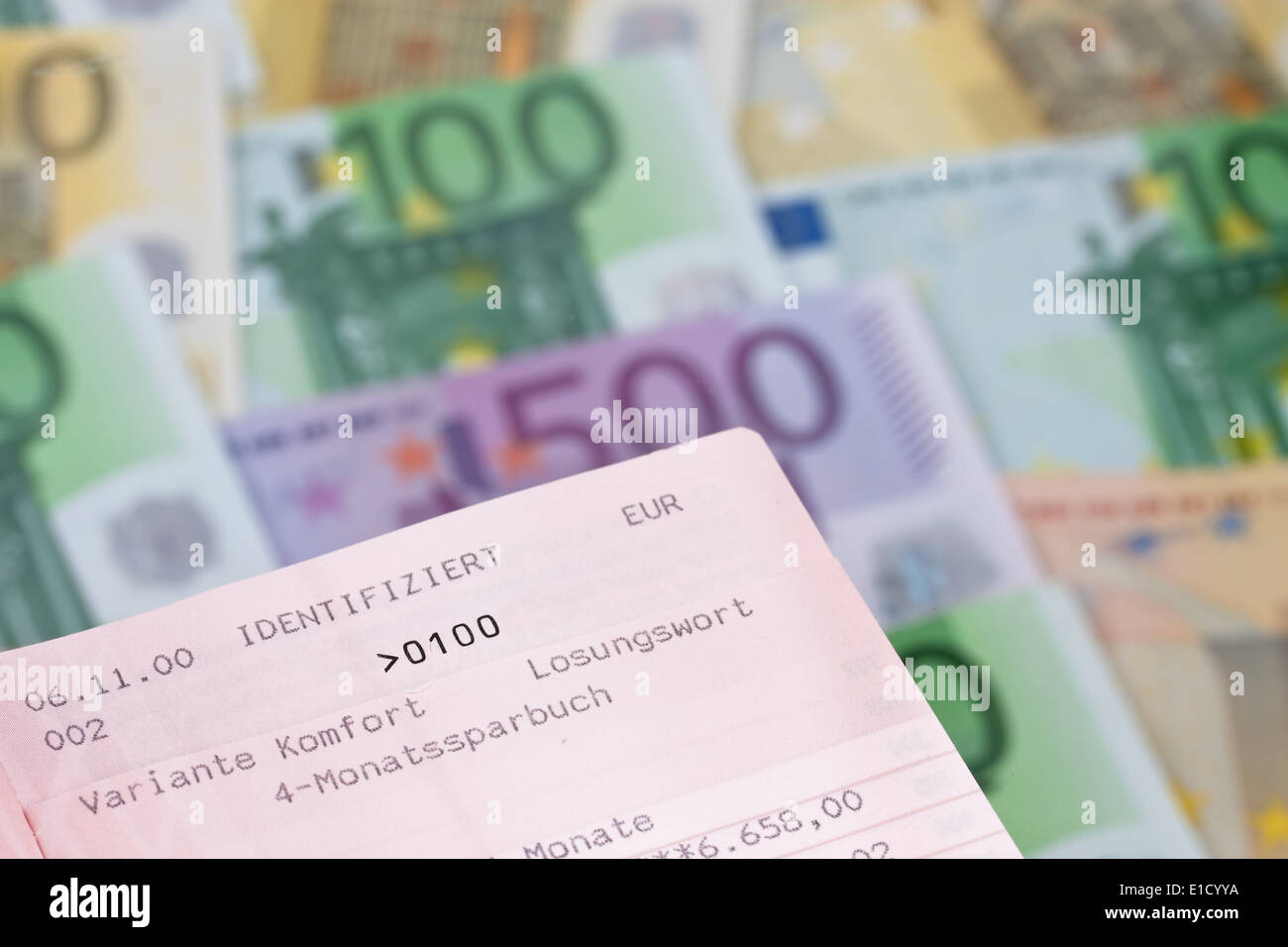 Many Euro bank notes with savings Stock Photo - Alamy