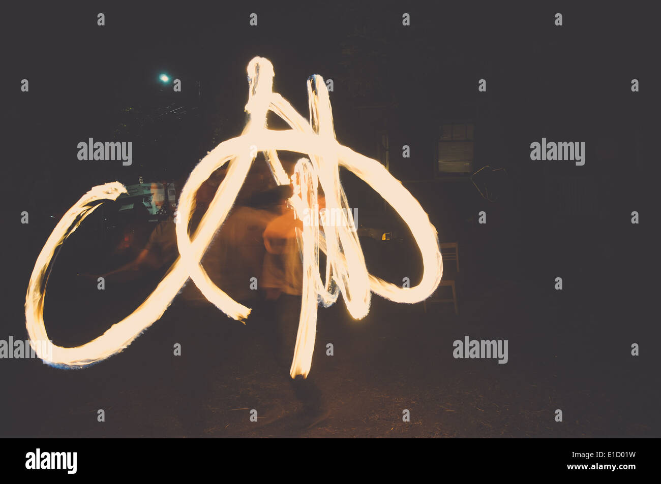 Motion of fire spinning through the air Stock Photo - Alamy