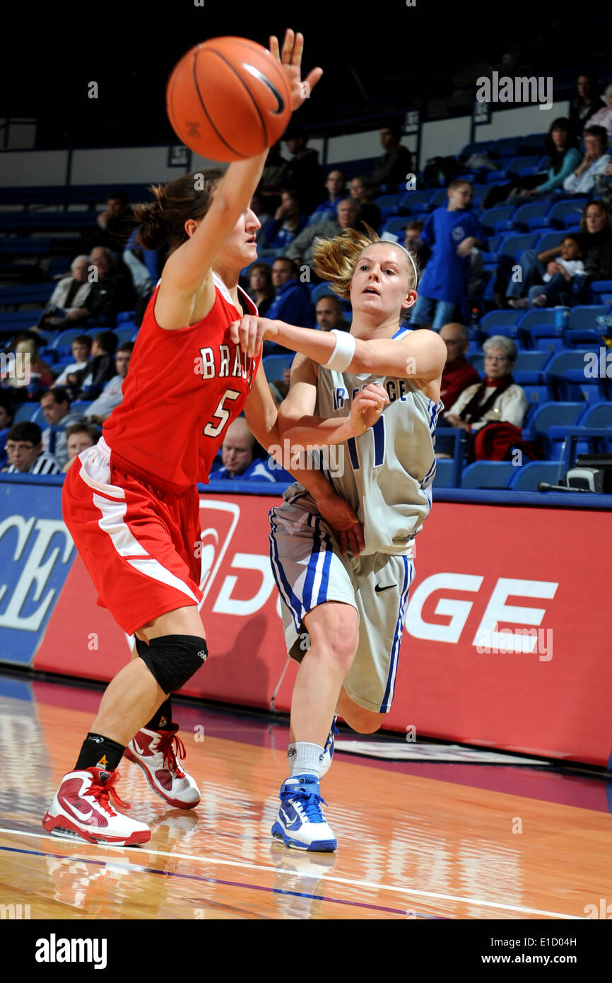 U.S. Air Force Academy sophomore guard Anna Gault passes the ball past ...