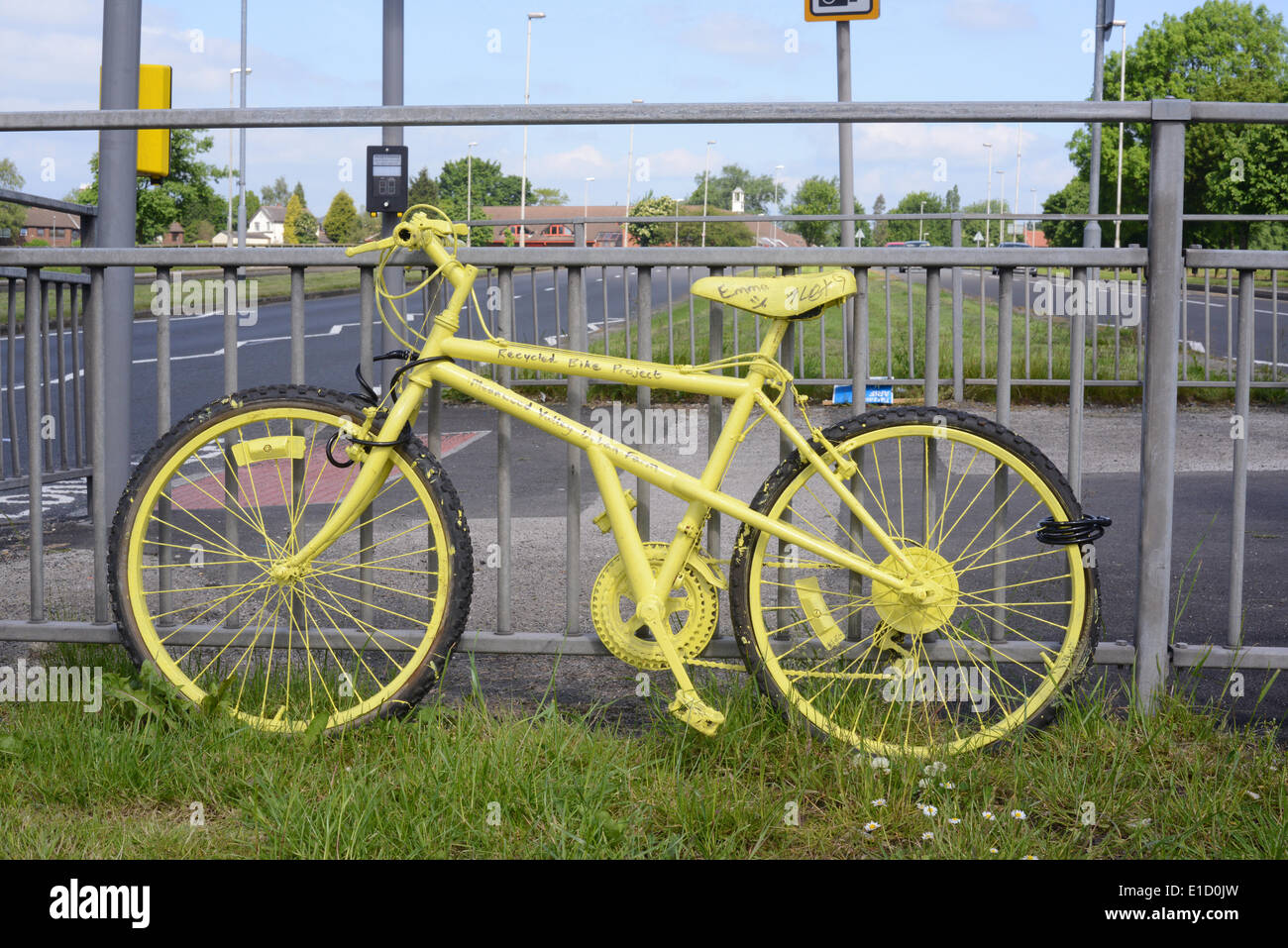 yellow bicycle marking the route of the start of the tour de france in ...