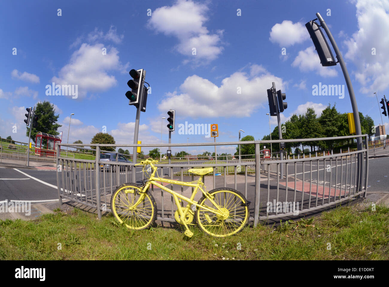 yellow bicycle marking the route of the start of the tour de france in ...