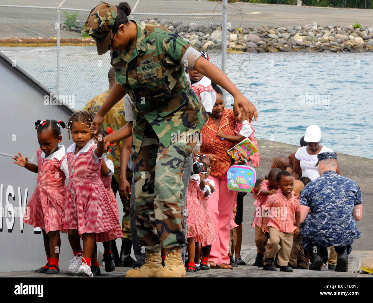 U.S. Navy Yeoman 1st Class Tiffany Summers helps students from Brain ...