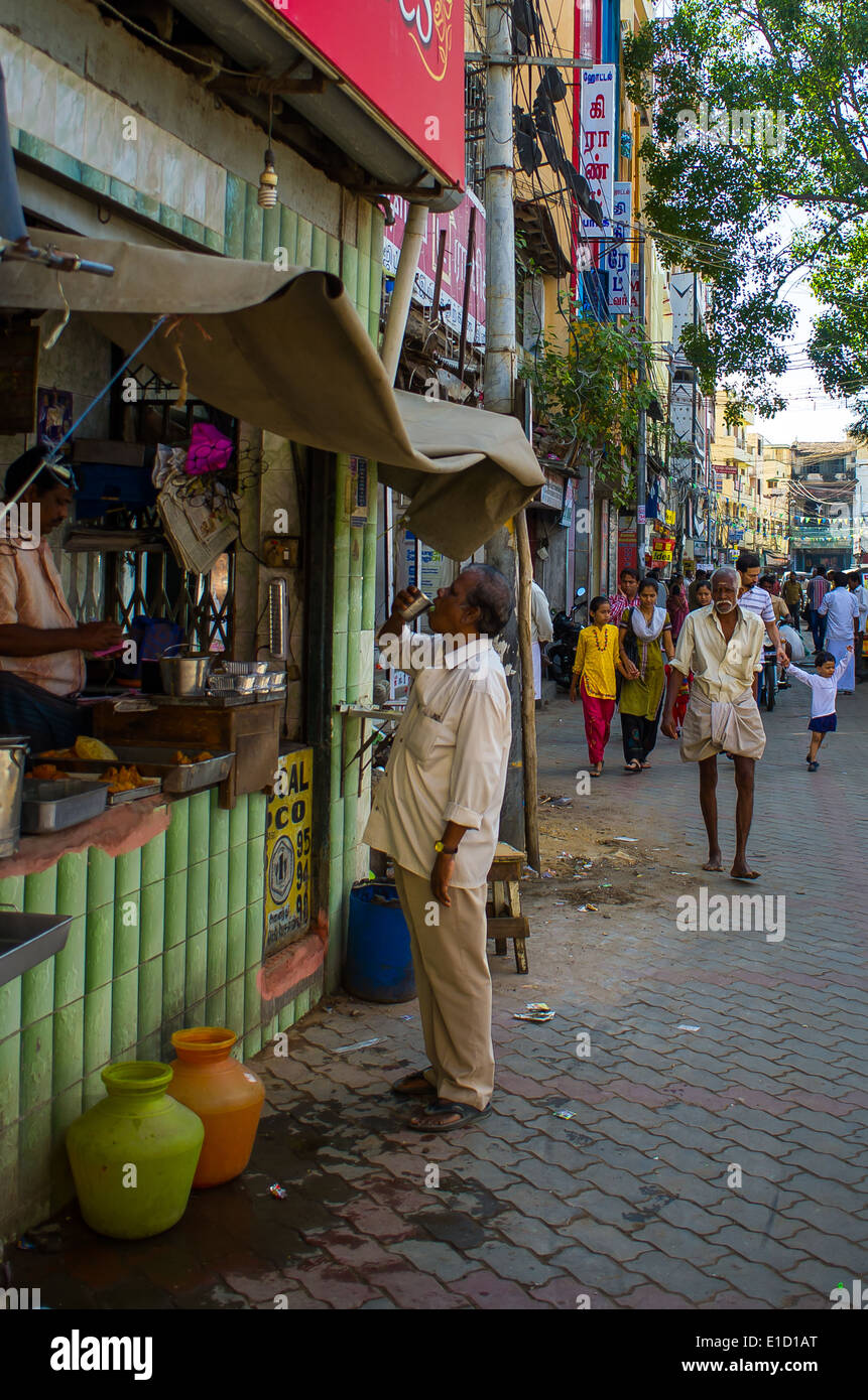 MADURAI/INDIA - DEC 23. City street with people on December 23, 2013 in ...