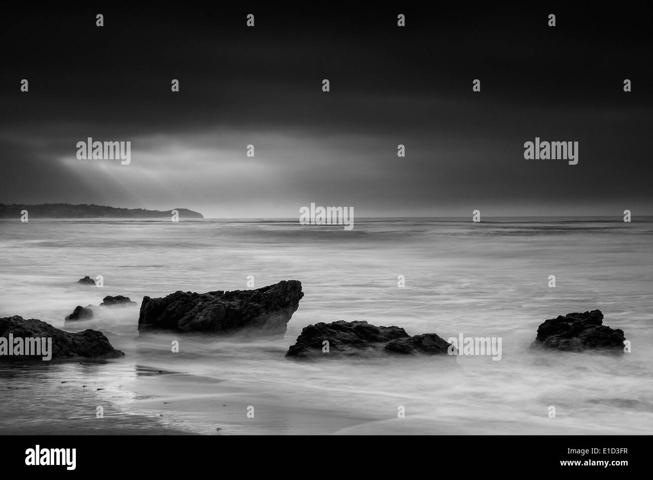 Dark black coastal rocks hi-res stock photography and images - Alamy