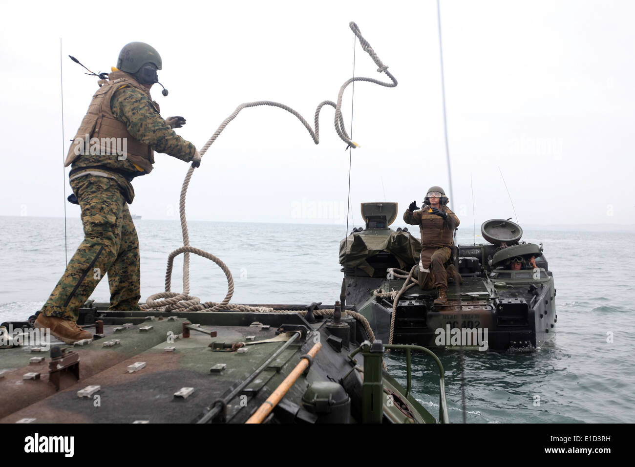 U.S. Marine Corps Staff Sgt. Roberto Medina, left, with 4th Platoon ...