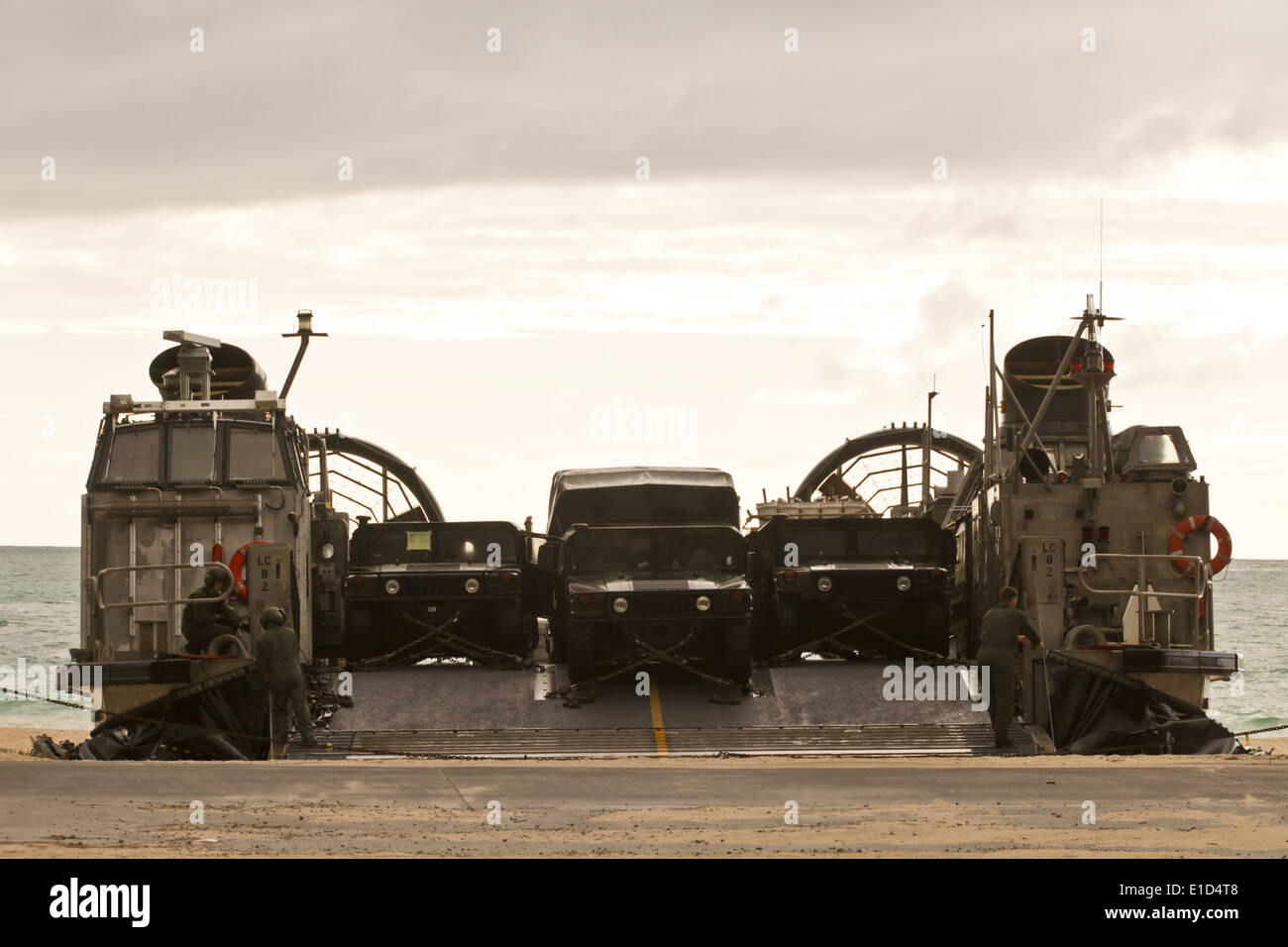 A landing craft, air cushion assigned to Assault Craft Unit 5 arrives ...