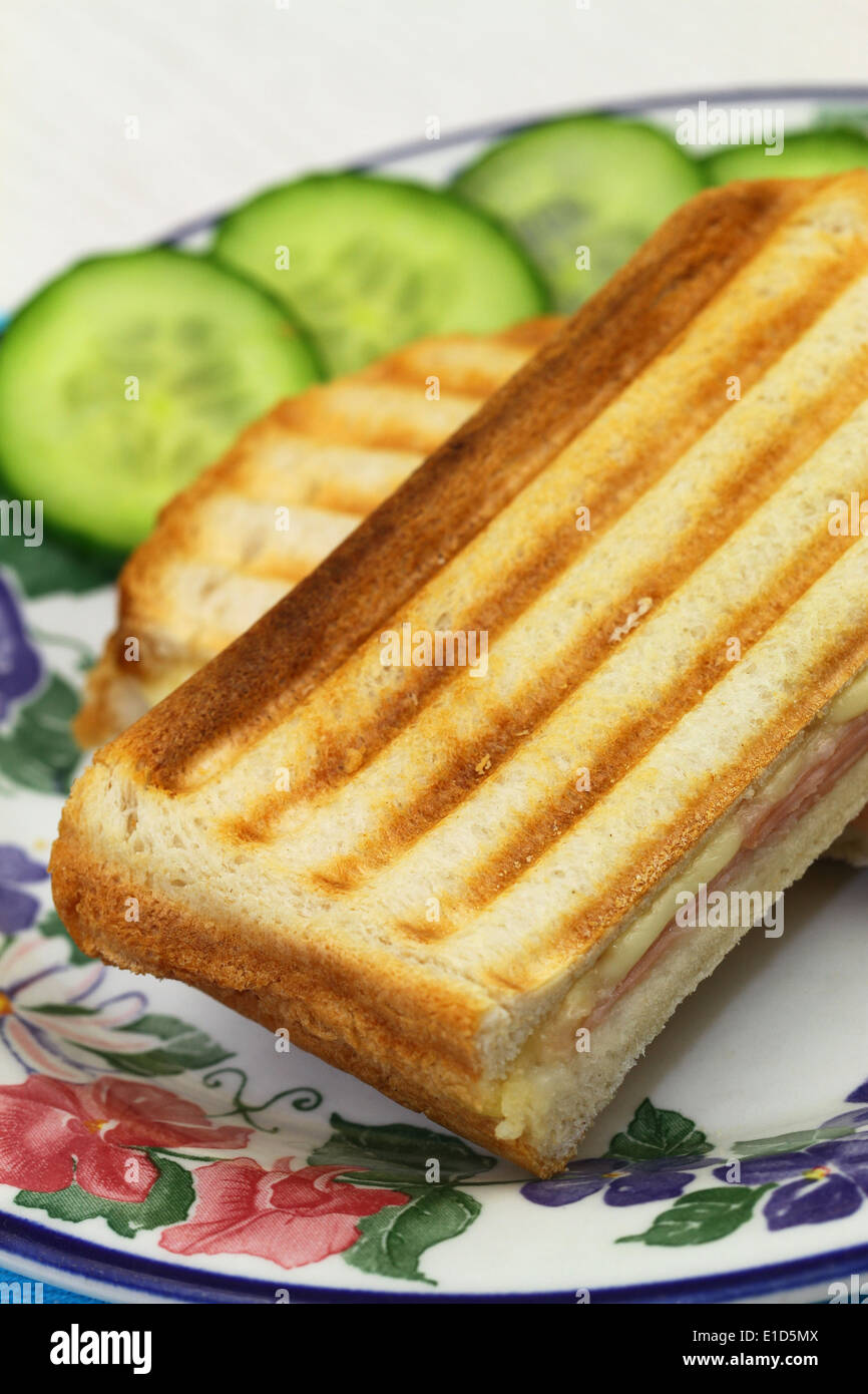 Toasted sandwich with ham and cheese, close up Stock Photo - Alamy