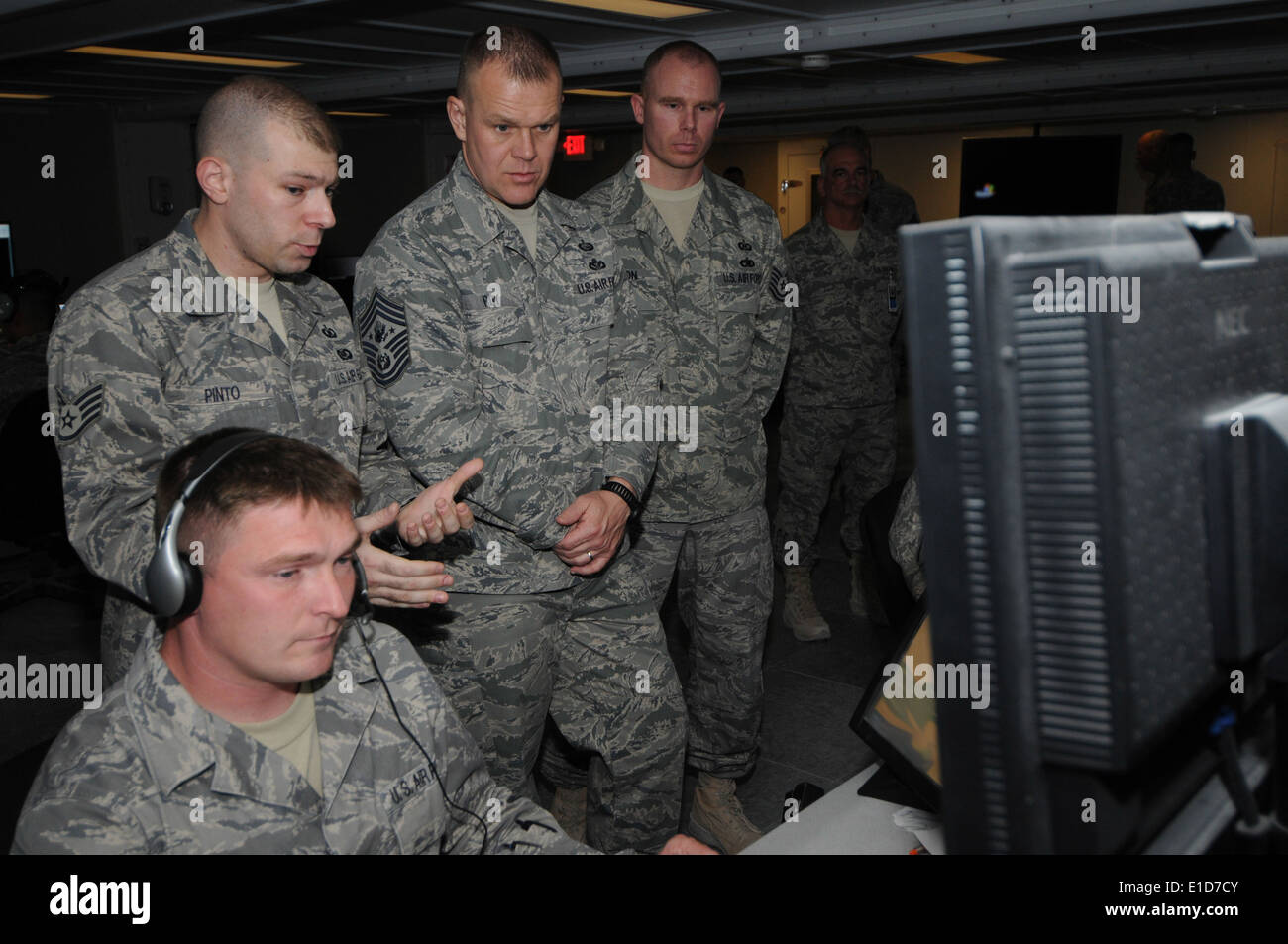 Chief Master Sgt. of the Air Force James A. Roy listens while being ...
