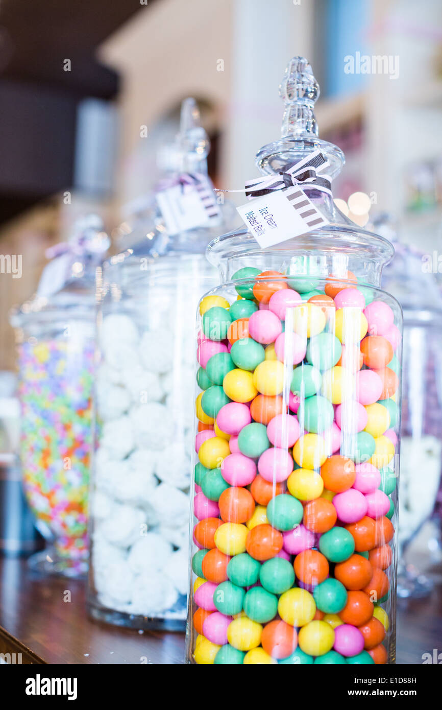 Multicolored candies on display at the candy store Stock Photo - Alamy