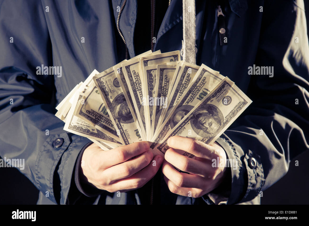 Holding cash hi-res stock photography and images - Alamy
