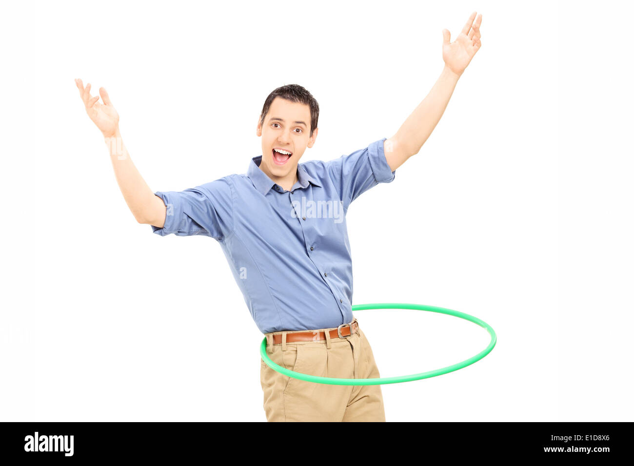 Young man exercising with hula hoop Stock Photo - Alamy