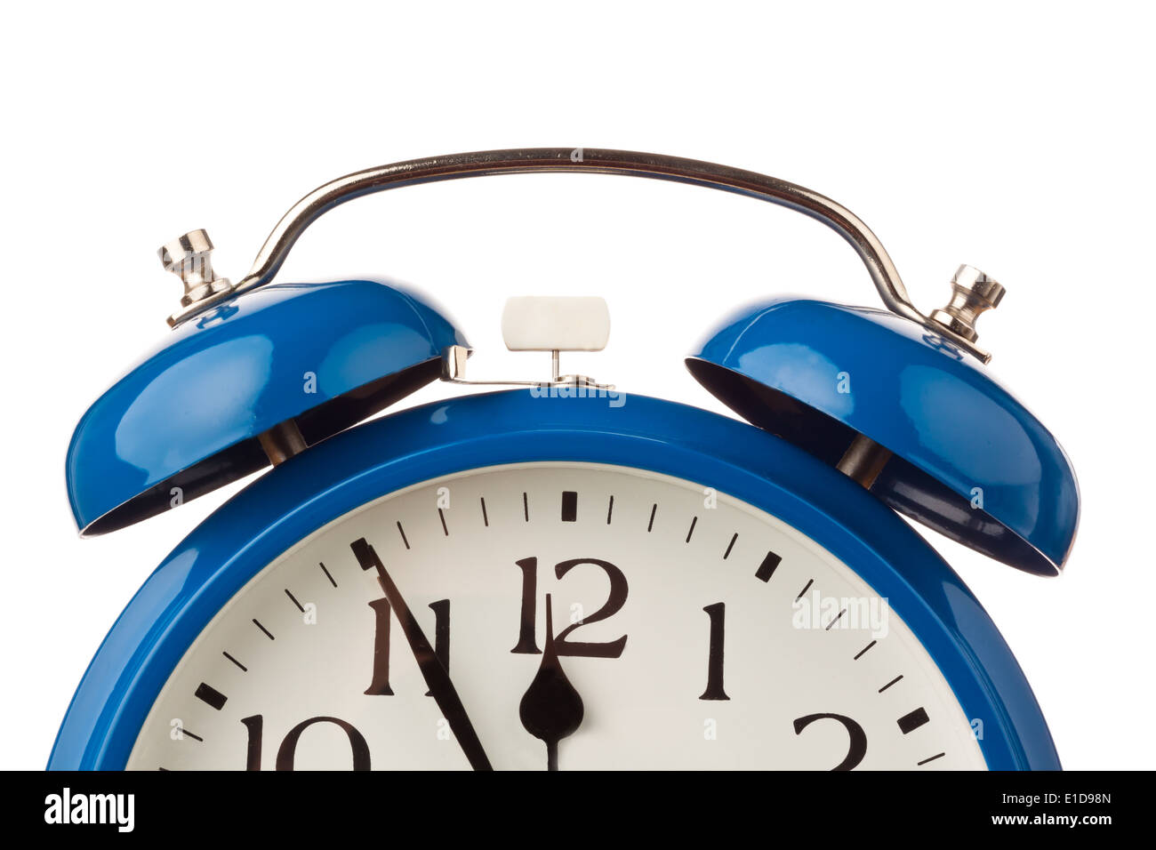 The dial of an alarm clock shows five to 12 Stock Photo - Alamy