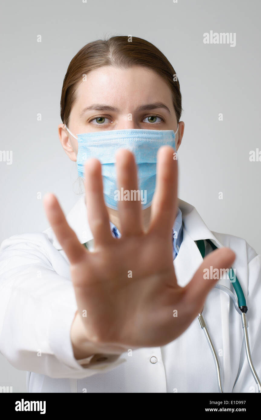 Doctor showing stop sign Stock Photo - Alamy