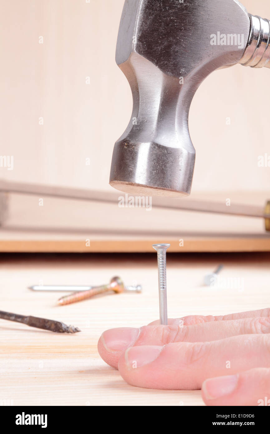 Pounding a nail hi-res stock photography and images - Alamy