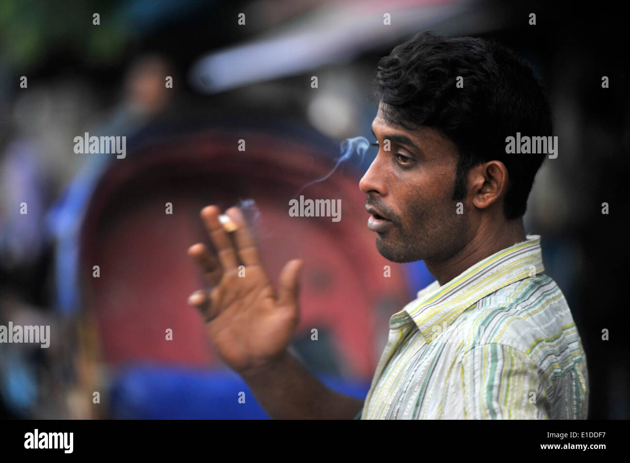 BANGLADESH-MAY 31: A tobacco addicts smoking in World No Tobacco Day ...