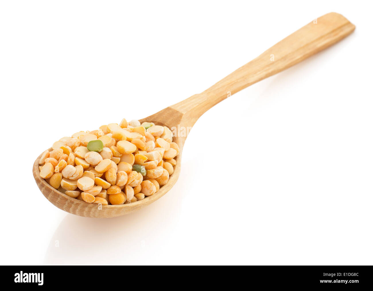 pea grain and wooden spoon on white Stock Photo - Alamy