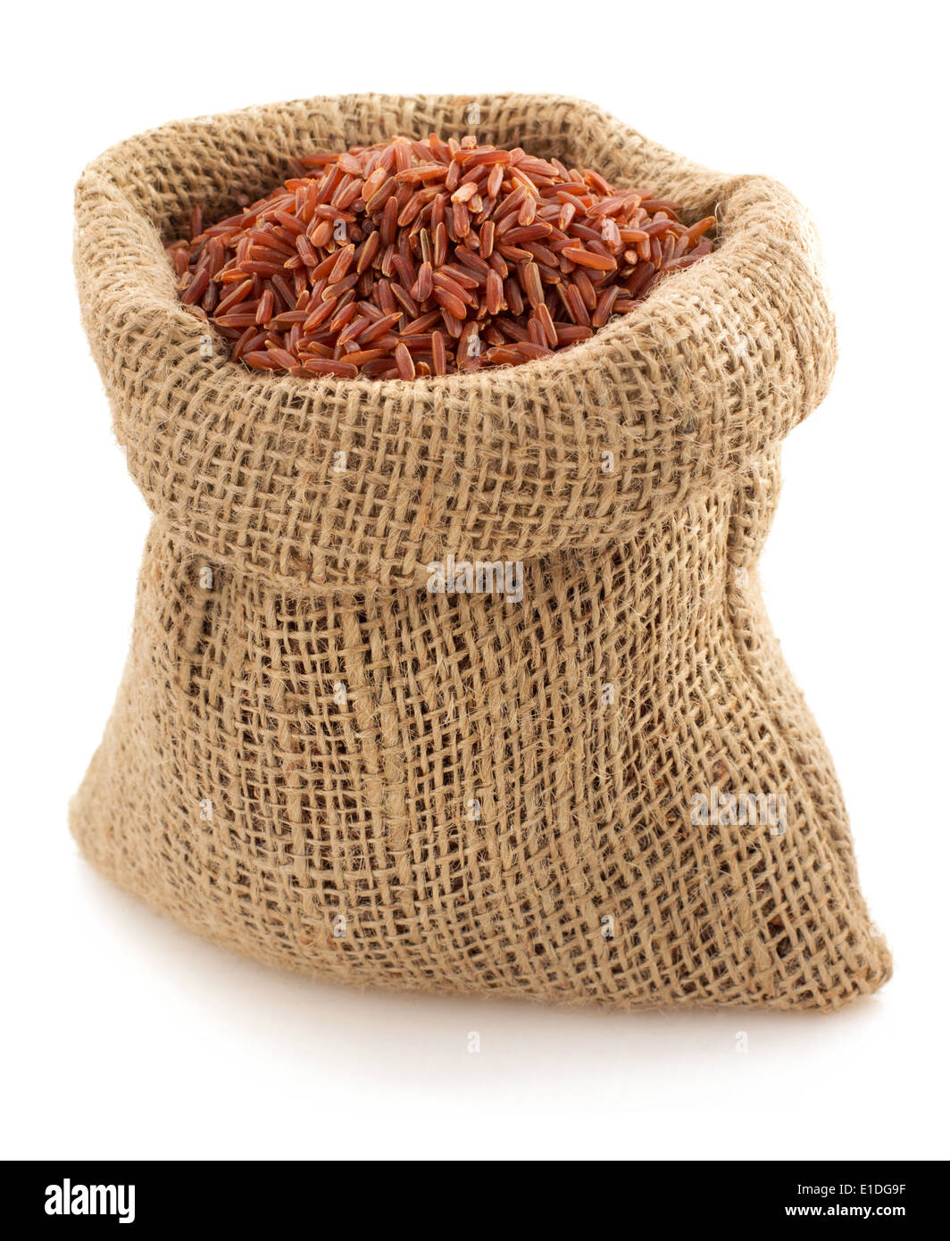 rice in sack bag on white background Stock Photo - Alamy
