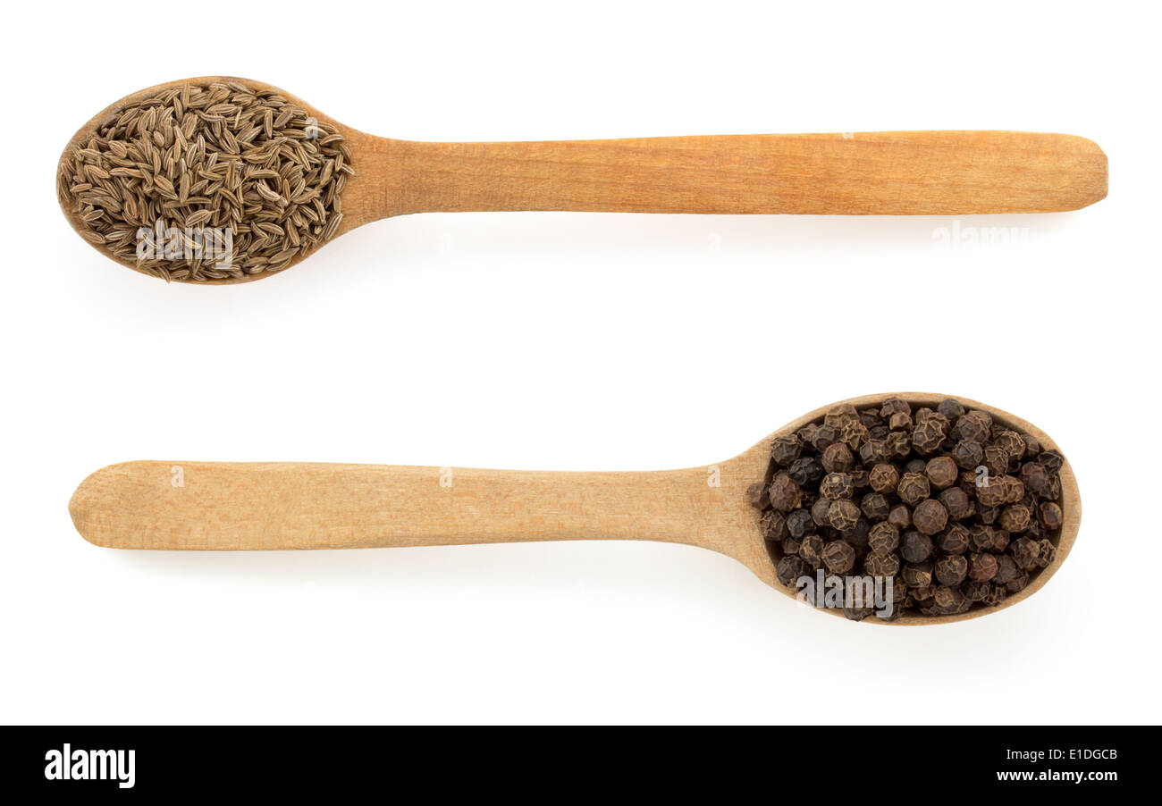 cumin seeds in spoon isolated on white background Stock Photo - Alamy