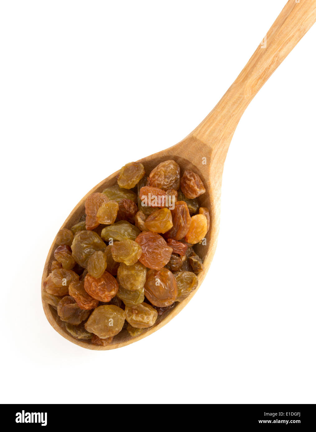 raisins fruit in spoon on white background Stock Photo - Alamy