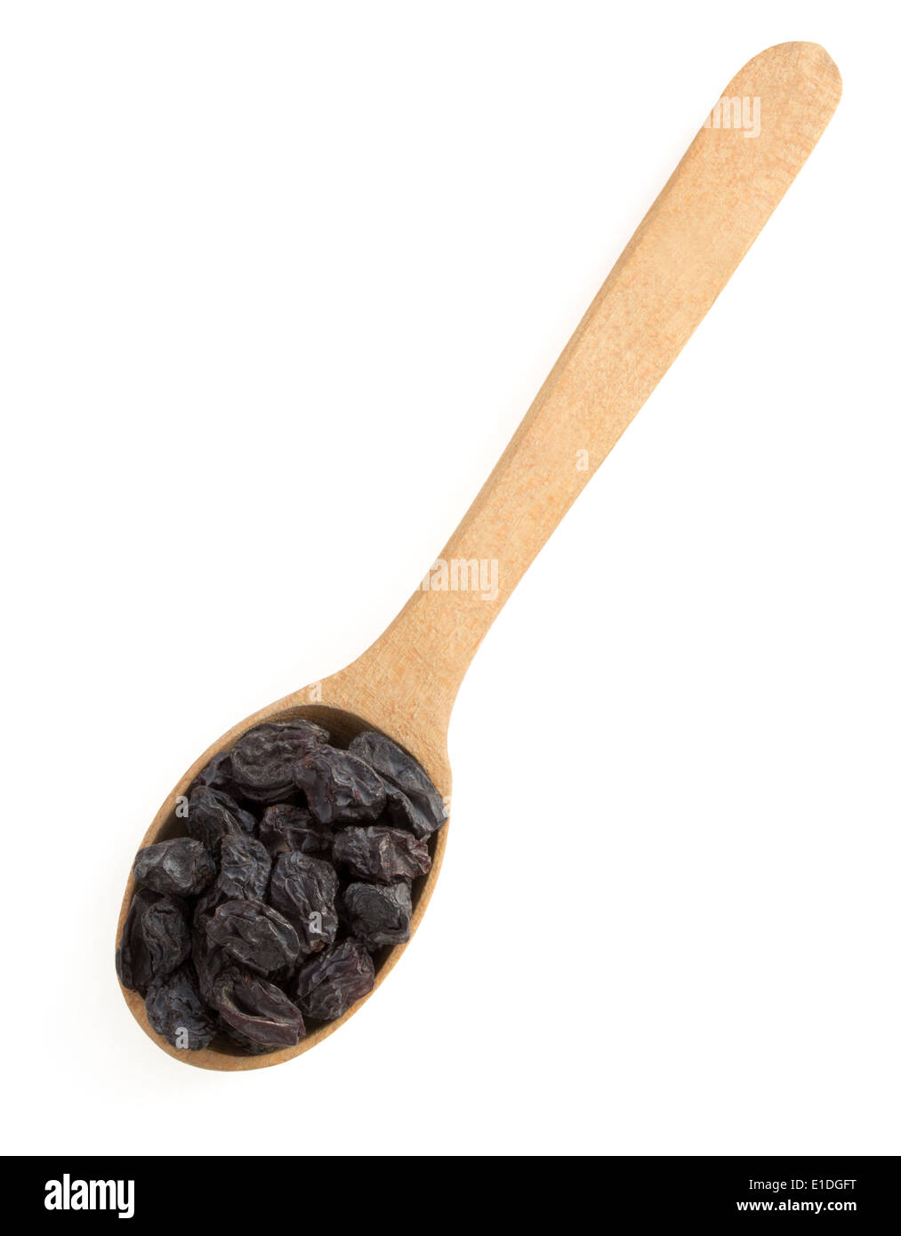 raisins fruit in spoon on white background Stock Photo - Alamy