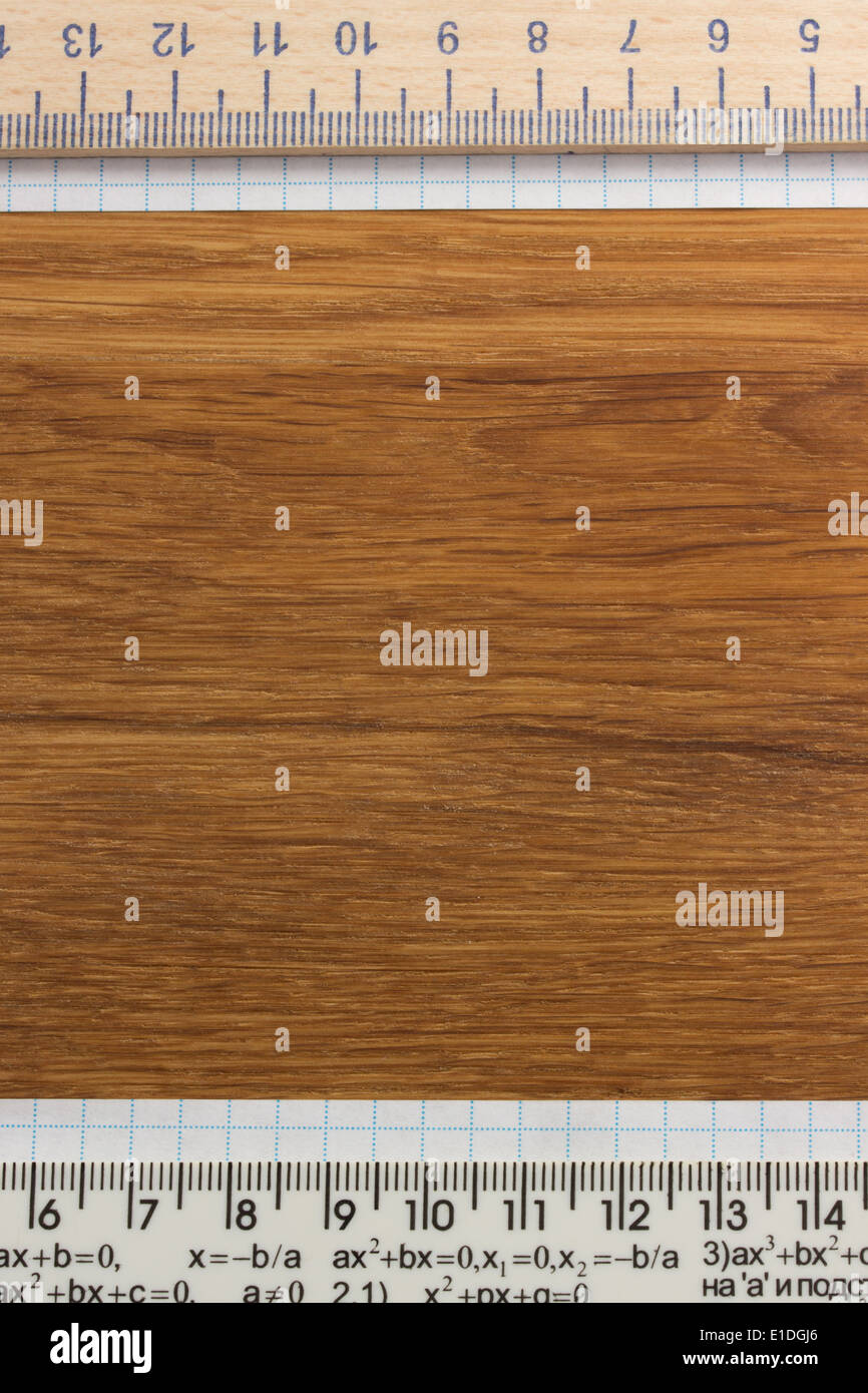 checked note paper on wooden background Stock Photo - Alamy