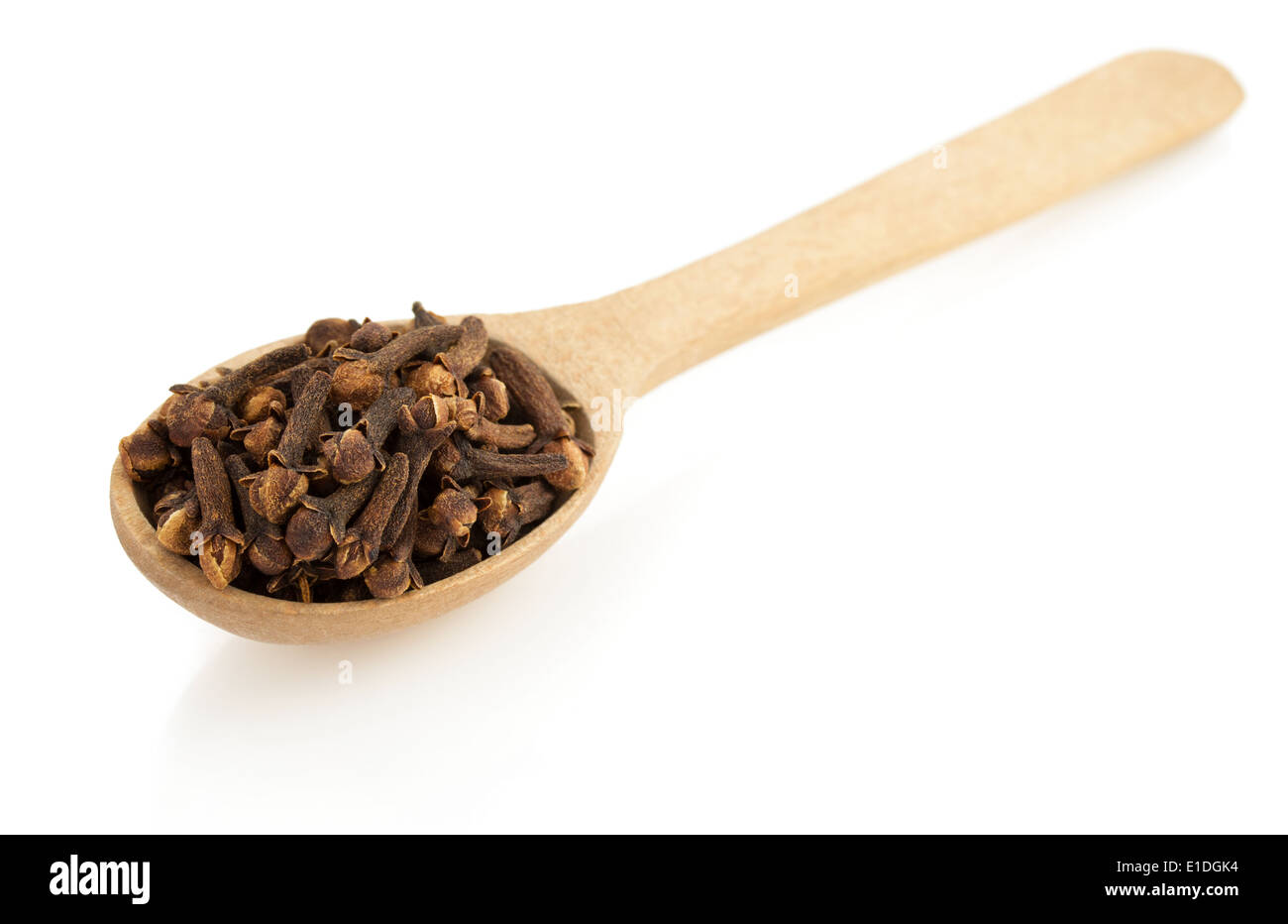 Clove spices wooden spoon isolated hi-res stock photography and images ...
