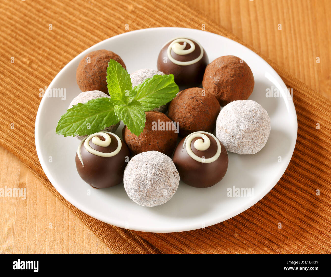 Delicious chocolate truffles with ganache filling Stock Photo - Alamy