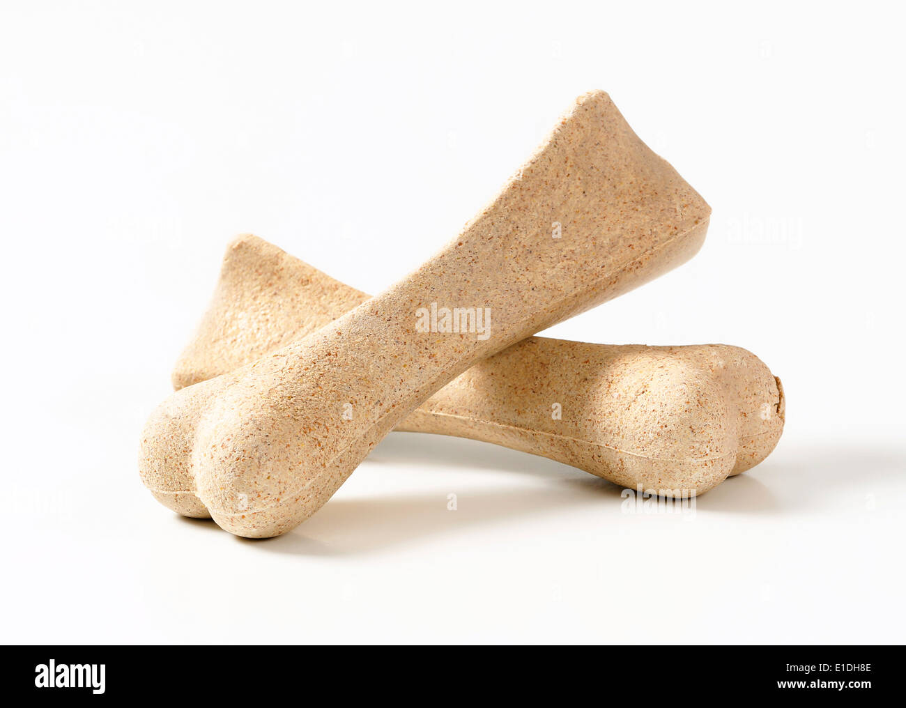 Large bone-shaped treats for dogs Stock Photo - Alamy