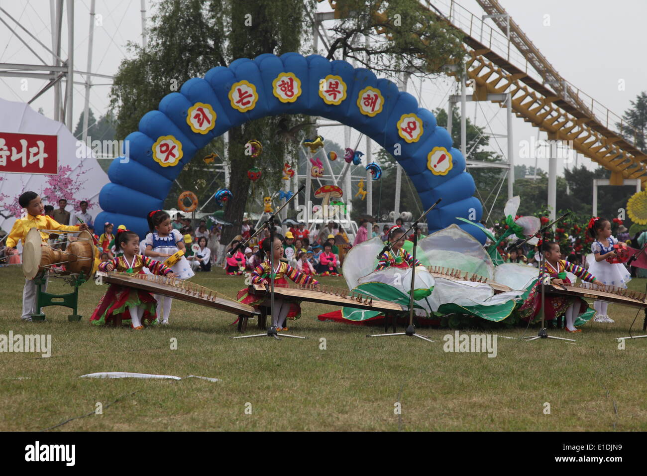 Pyongyang. 1st June, 2014. Children play musical instruments at the ...