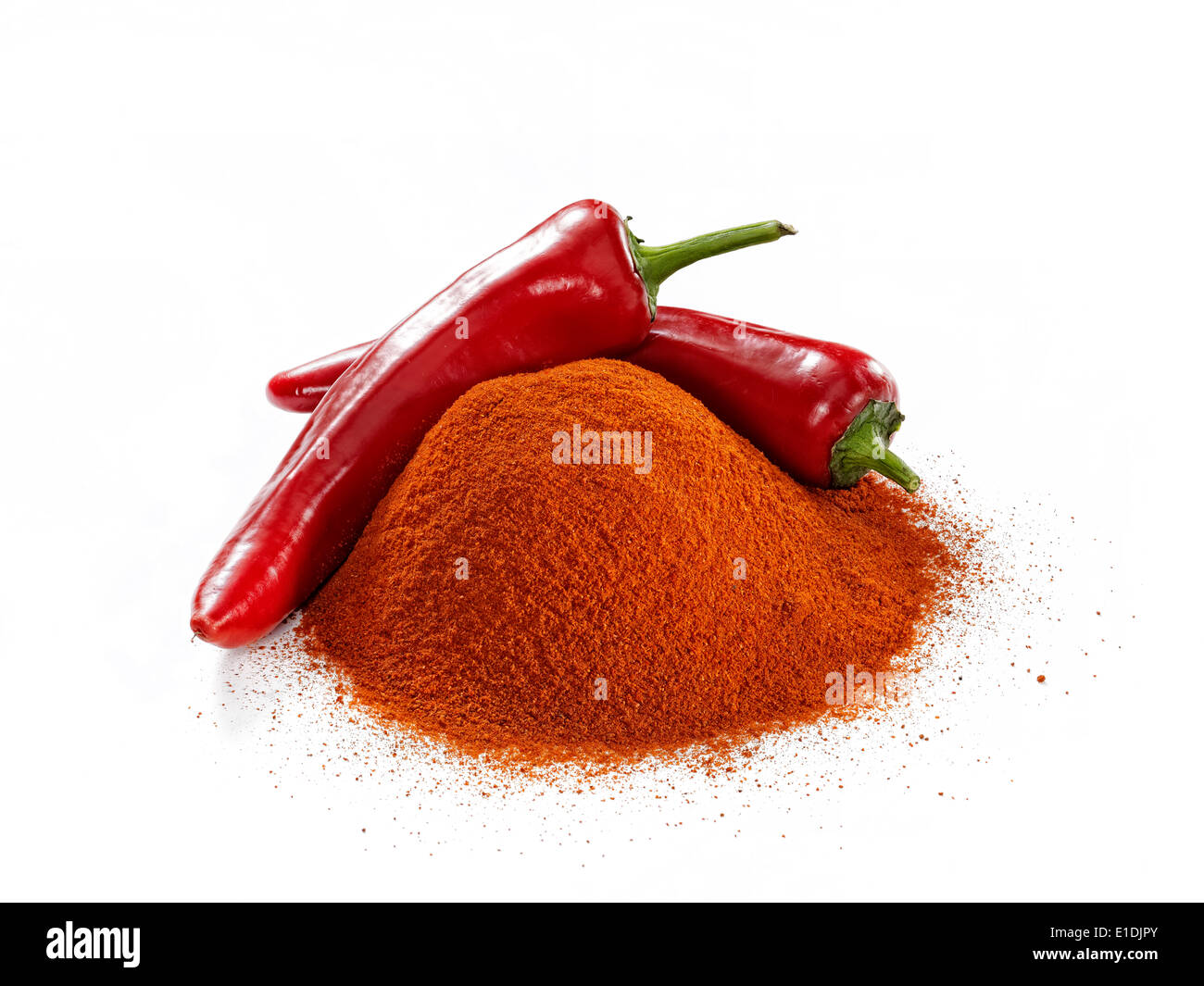 Minced and whole red peppers on white background Stock Photo - Alamy