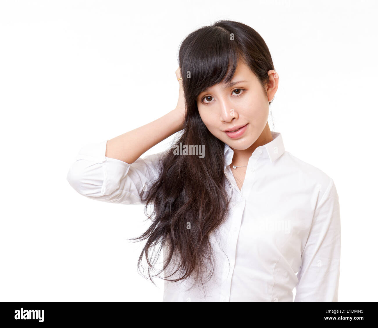 Chinese woman with palm of hand against head Stock Photo - Alamy