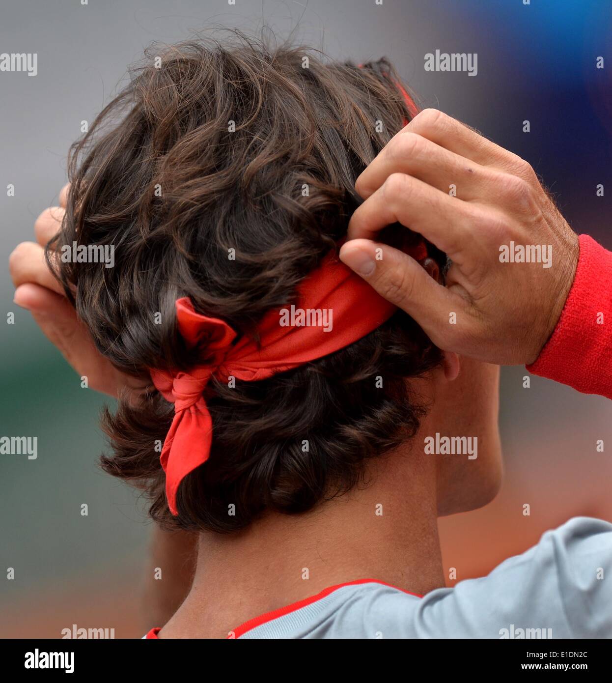 Paris, France. 1st June, 2014. Switzerland's Roger Federer adjusts his ...
