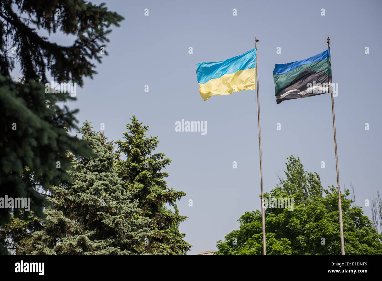 Ukrainian and Dobropillia flag in front of City Hall in Dobropillia ...