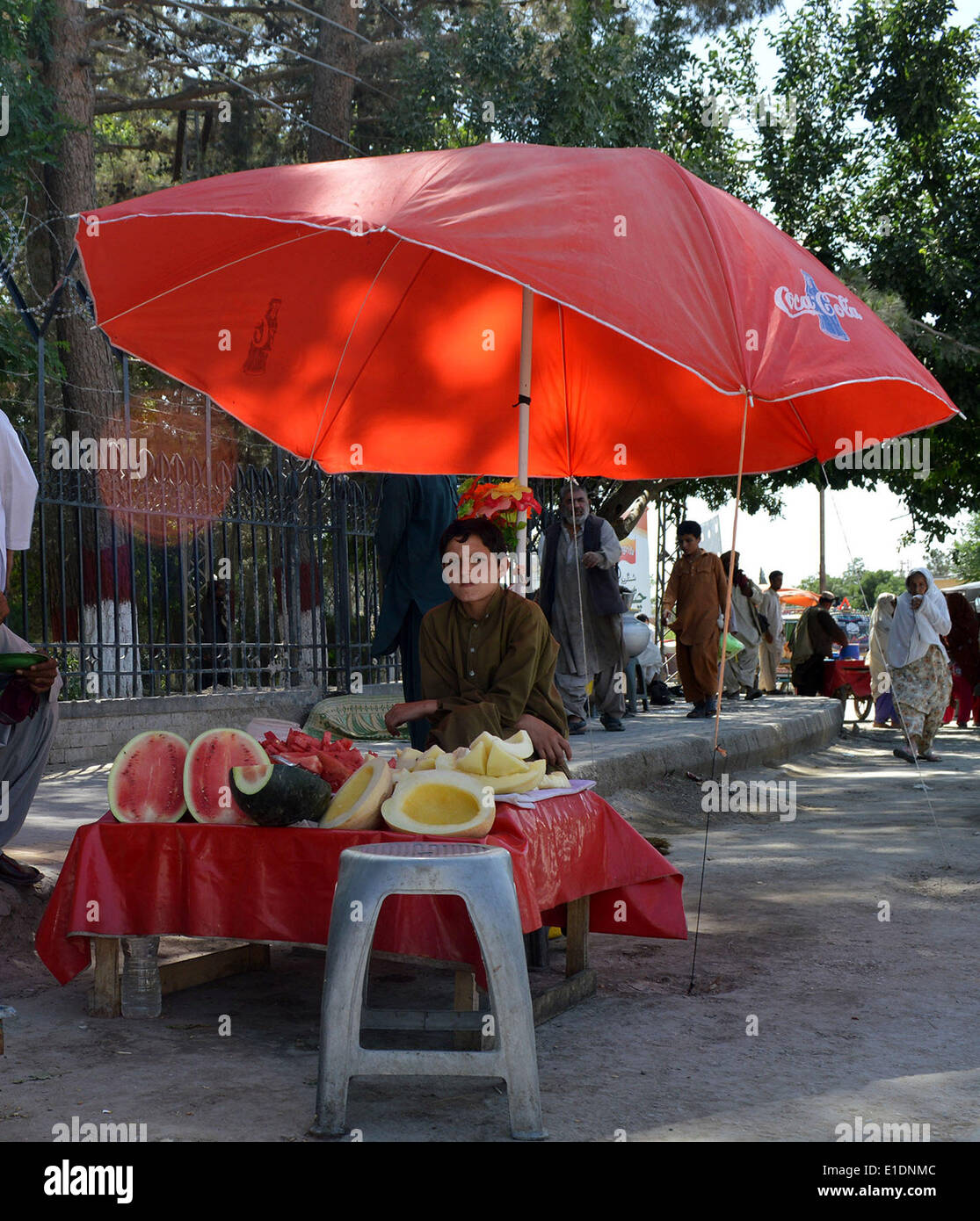 Quetta. 1st June, 2014. A Pakistani boy sells watermelons in southwest ...