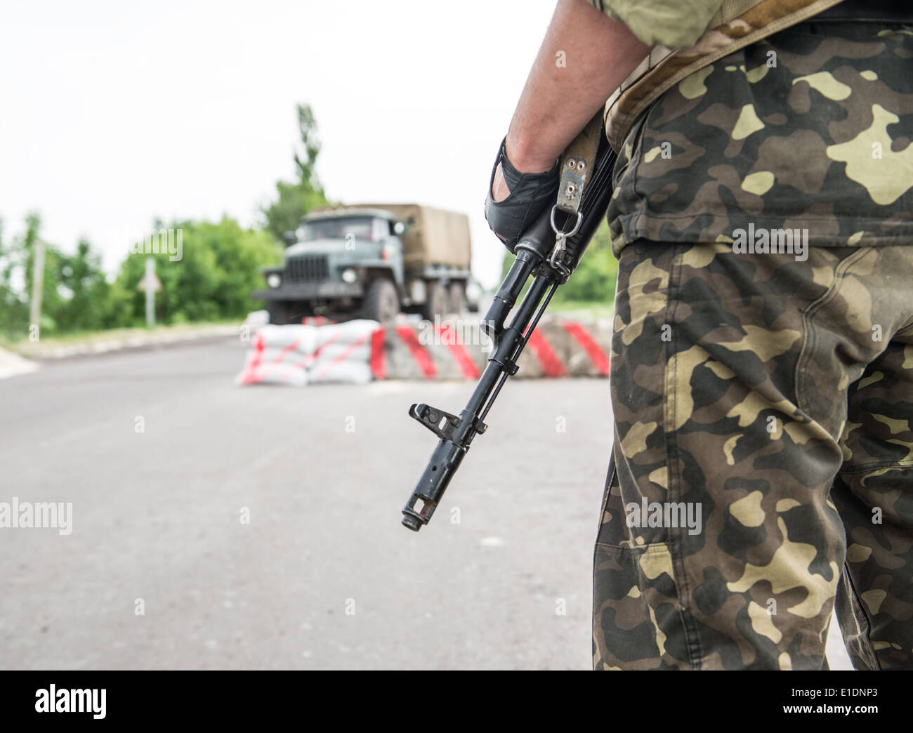 Ukrainian soldier on a check point near Dobropillia in Donetsk Oblast ...