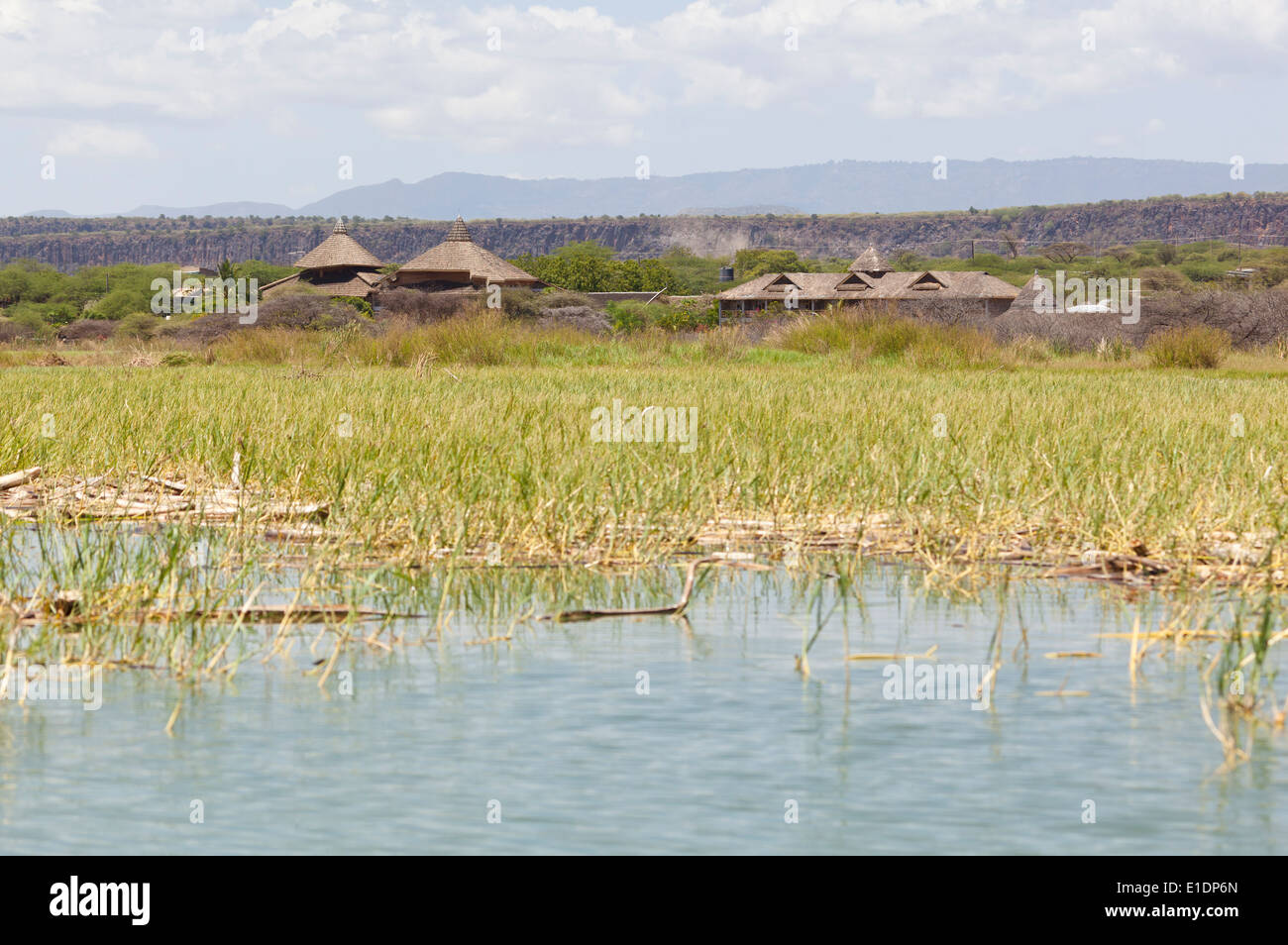 Lake Baringo shore with highwater in Kenya and some resort buildings in ...