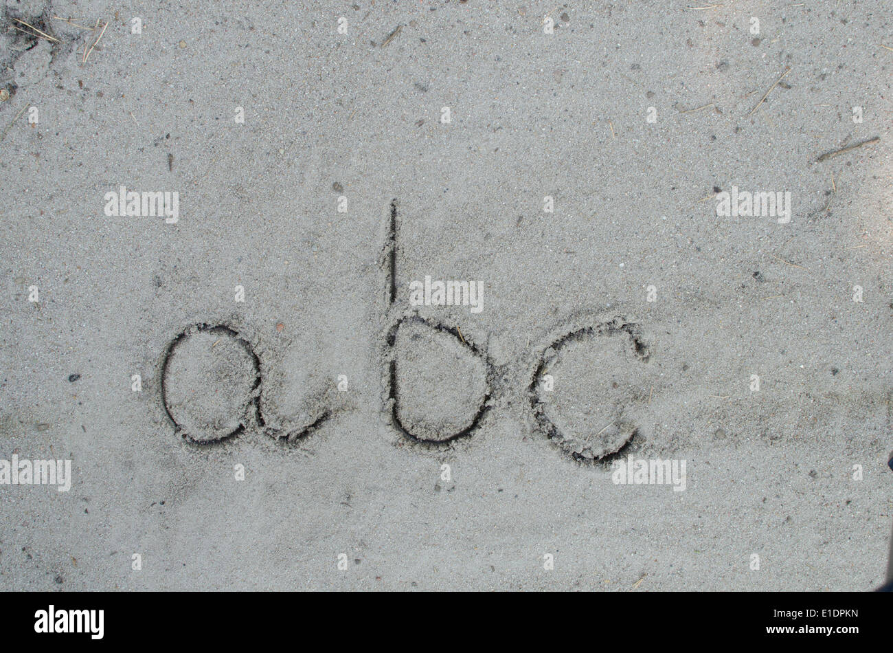 Inscription handwritten on sand close hi-res stock photography and ...