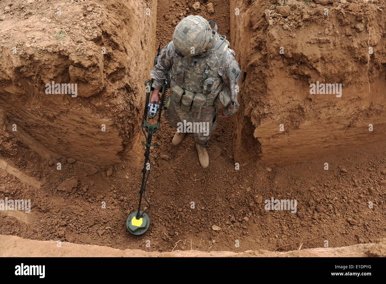 U.S. Army Spc. Brad Ullrich helps members of Green Platoon, Combined ...