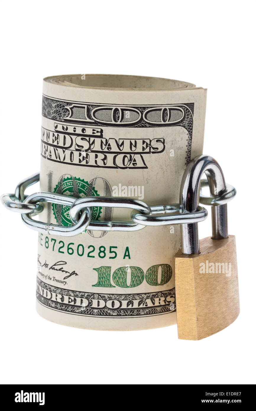Many dollar bills are locked with a lock Stock Photo - Alamy