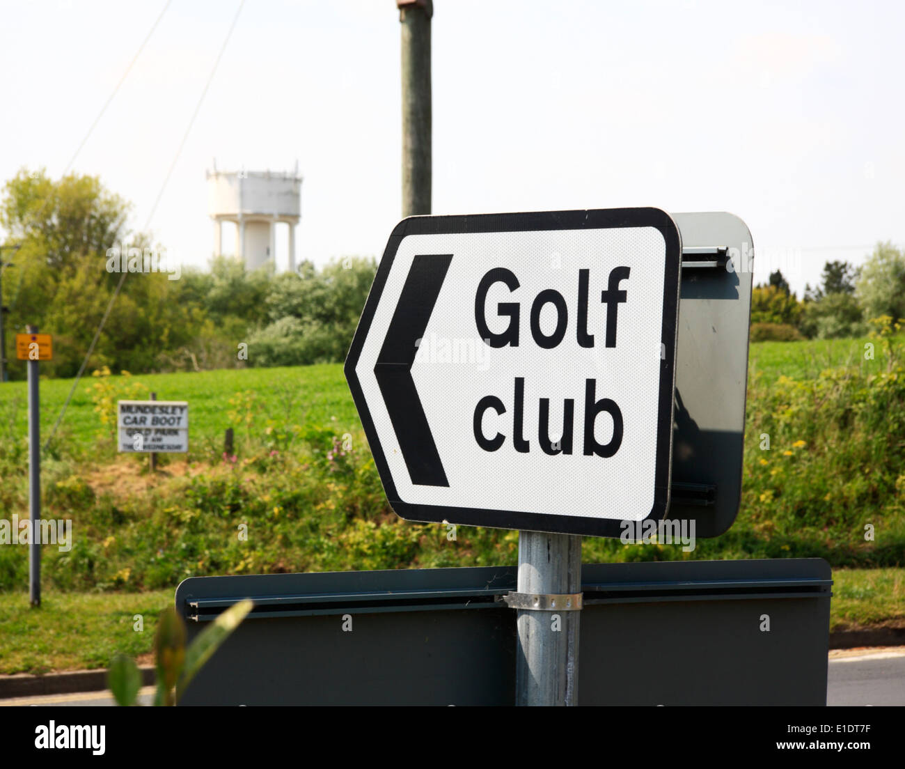 A road sign giving direction to a Golf Club Stock Photo - Alamy