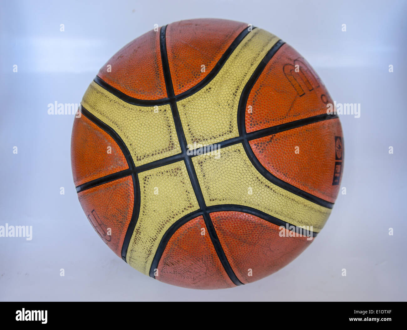 old basketball on white background Stock Photo - Alamy